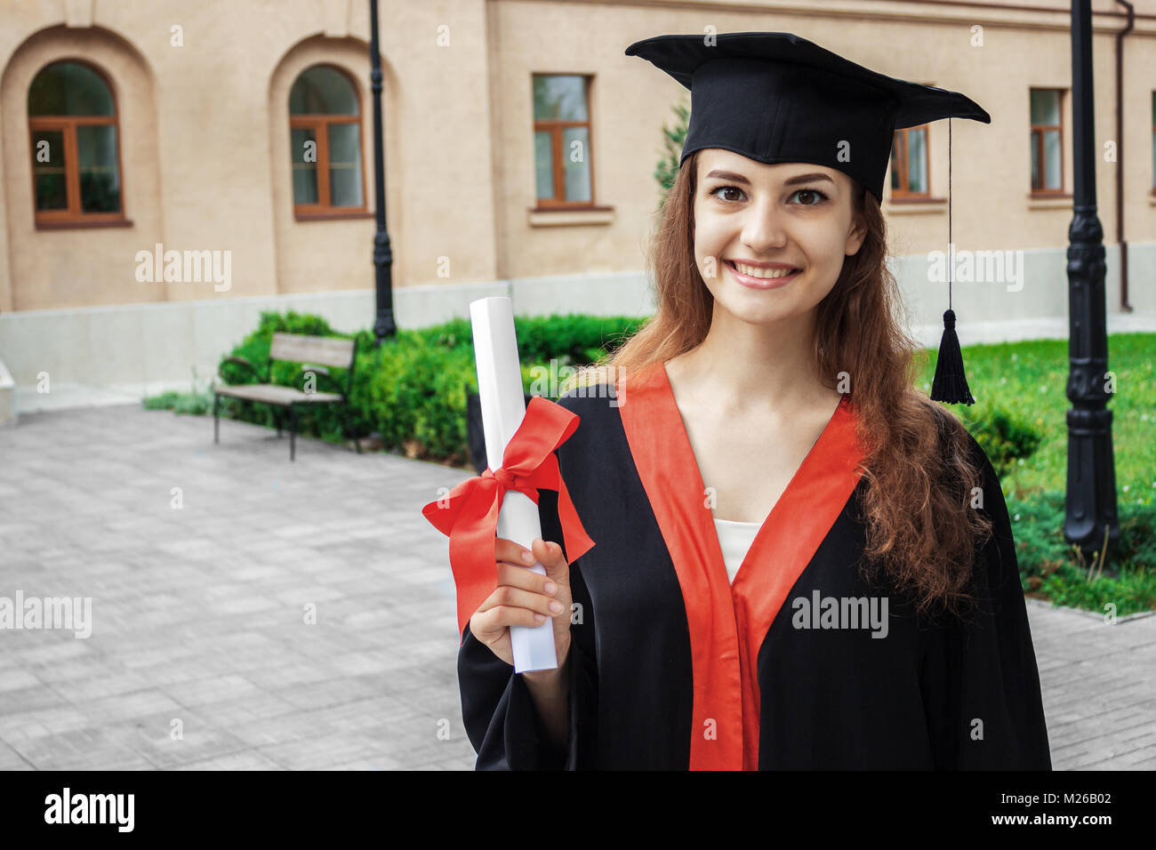 Happy woman on her graduation day University. Education and people ...