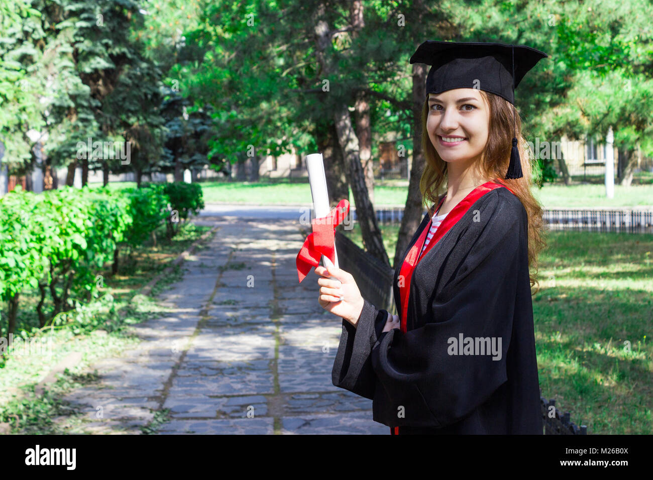 Happy woman on her graduation day. University, education and happy ...