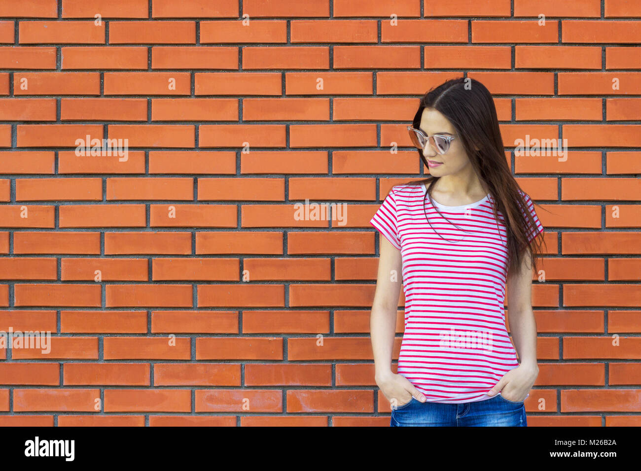 Attractive Woman Wearing Striped T Shirt And Fashionable Sunglasses