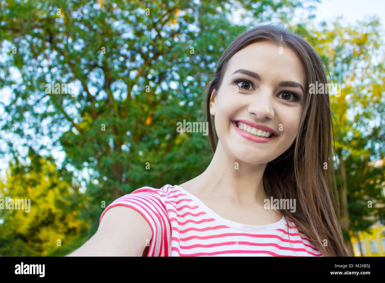 Close-up of trendy girl face in sunglasses is making selfie photo Stock ...