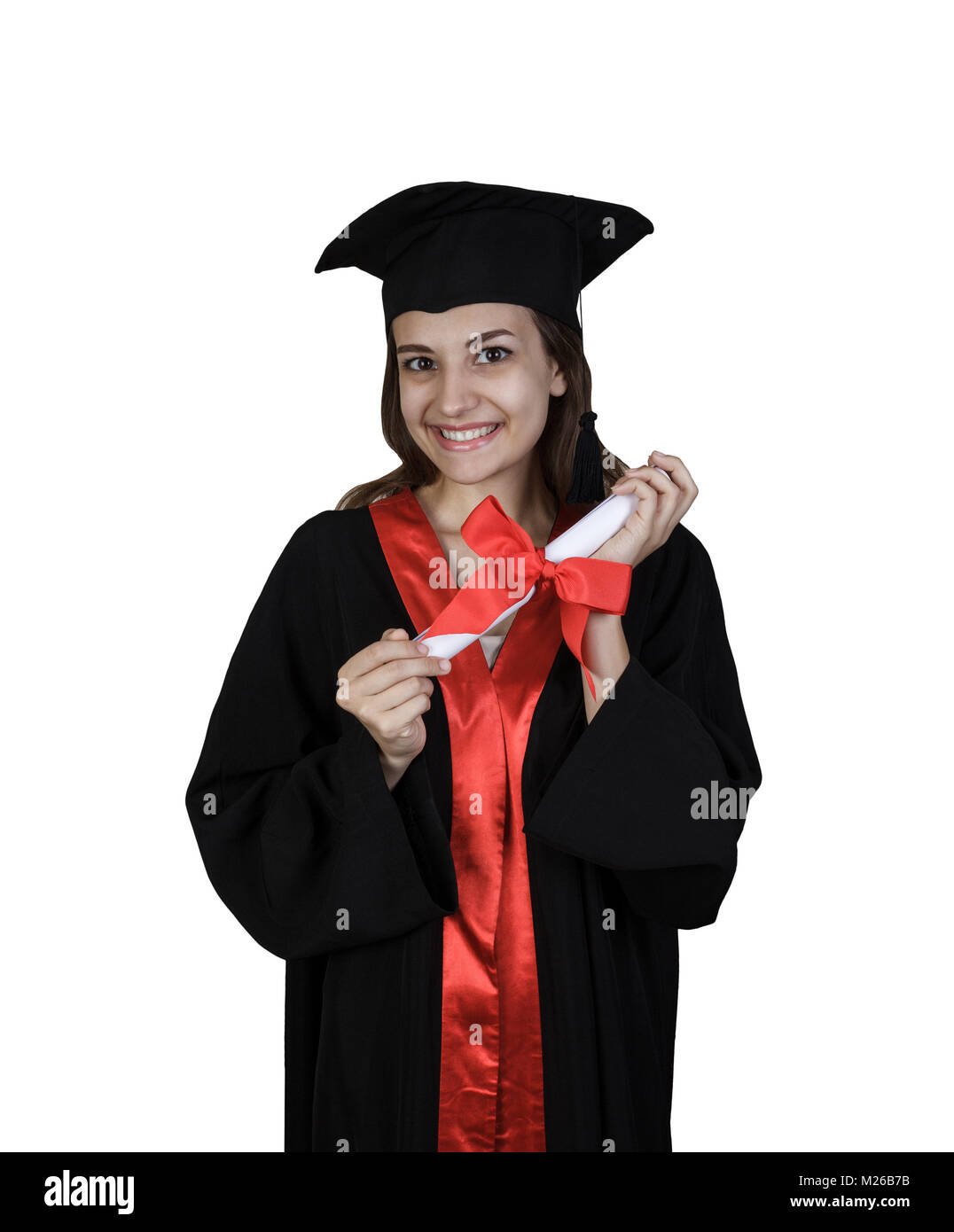 Graduating student girl in an academic gown, isolated on white ...