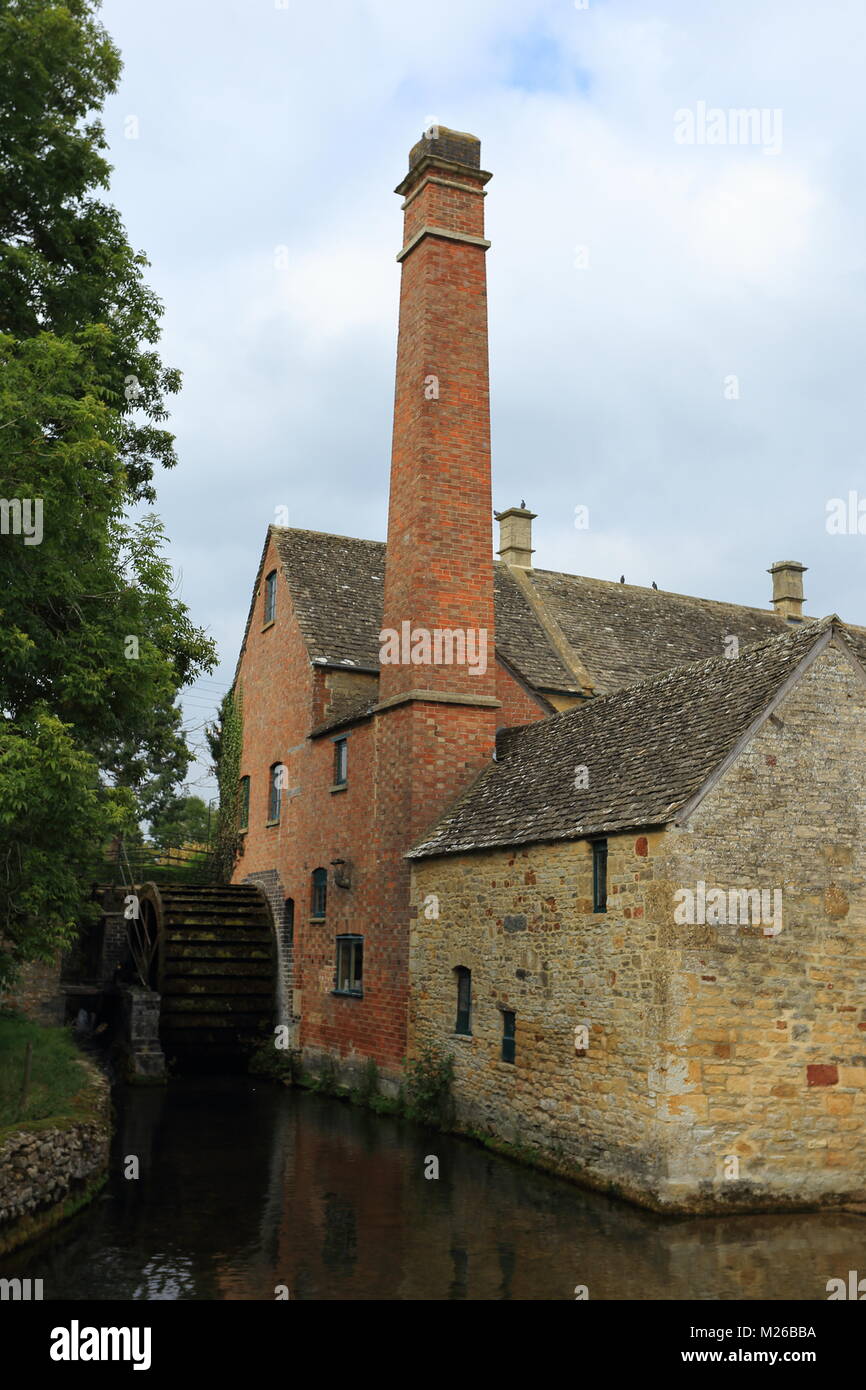 The historic preserved water mill at the village of Lower Slaughter, in ...