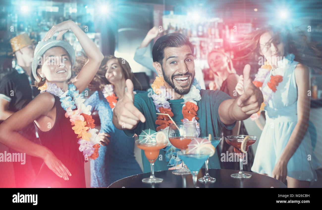 Happy man 31-35 years old is having fun on hawaiian party Stock Photo ...