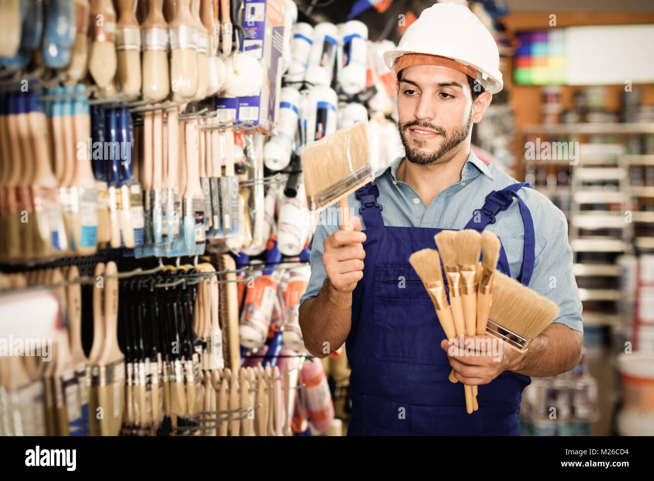Happy satisfied handyman in hi-res stock photography and images - Alamy