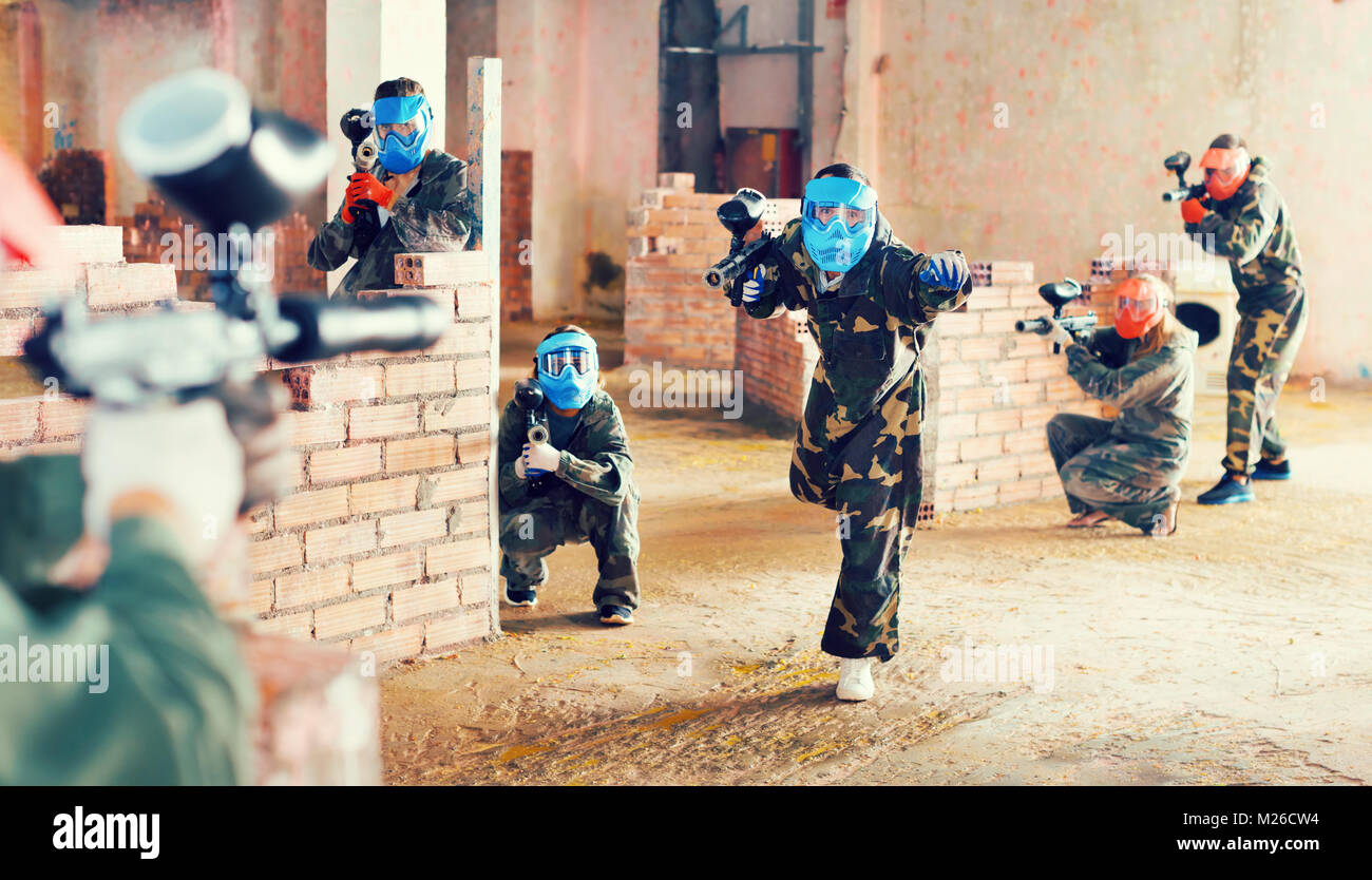 Game teams are face to face on the paintball ground Stock Photo - Alamy