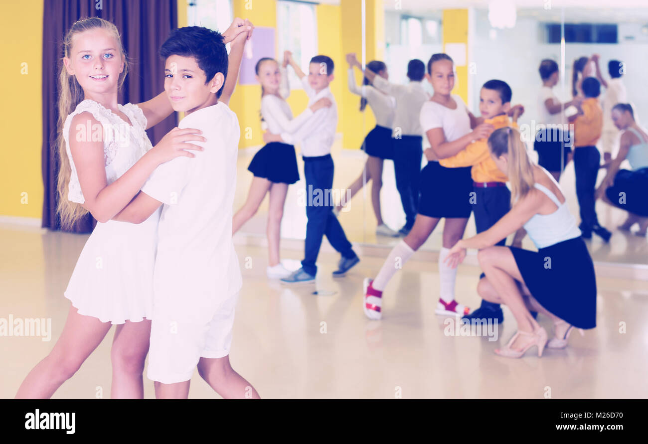 Happy children studying of partner dance at dance classes Stock Photo ...