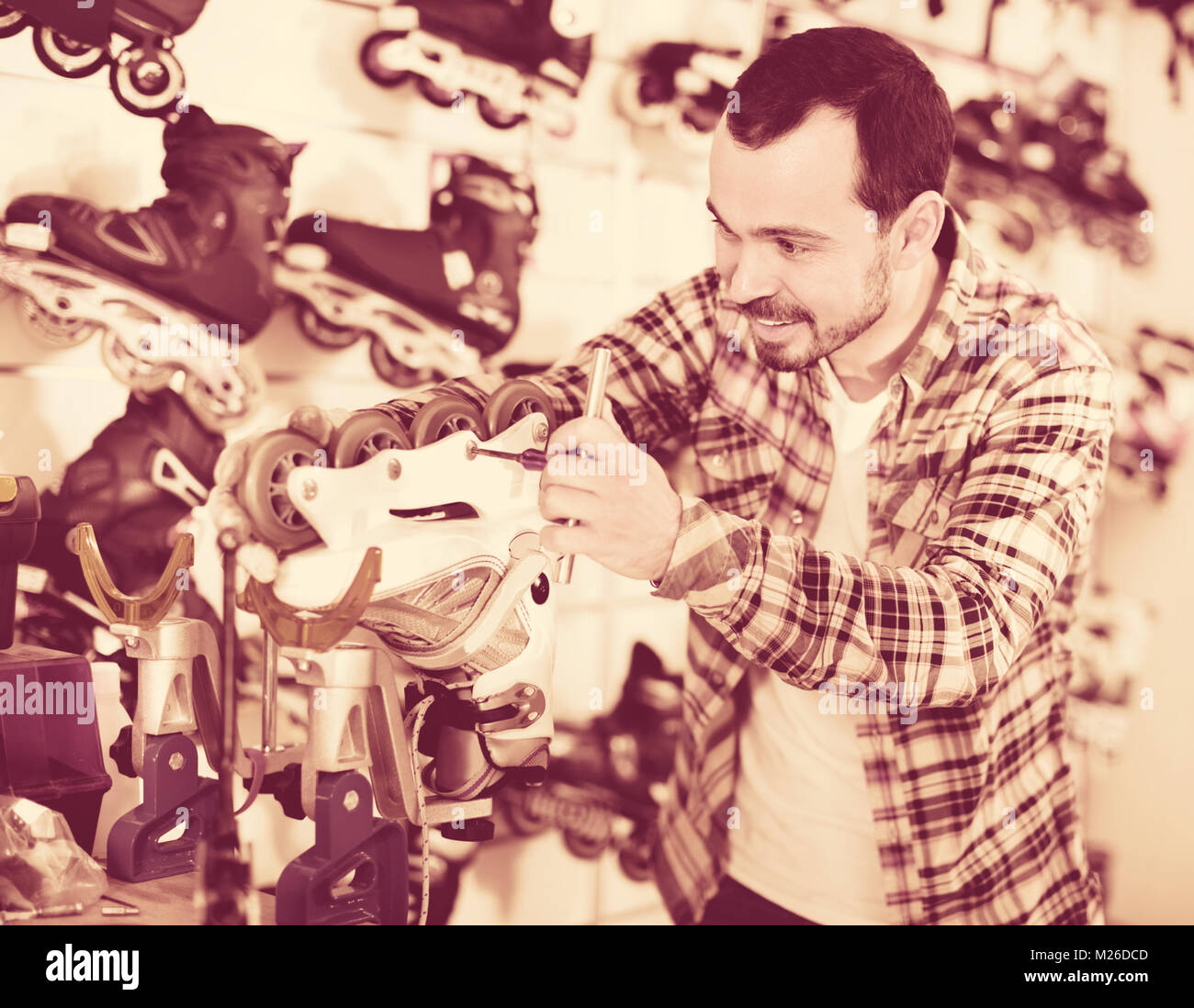 Cheerful male master fixing hi-res stock photography and images - Alamy