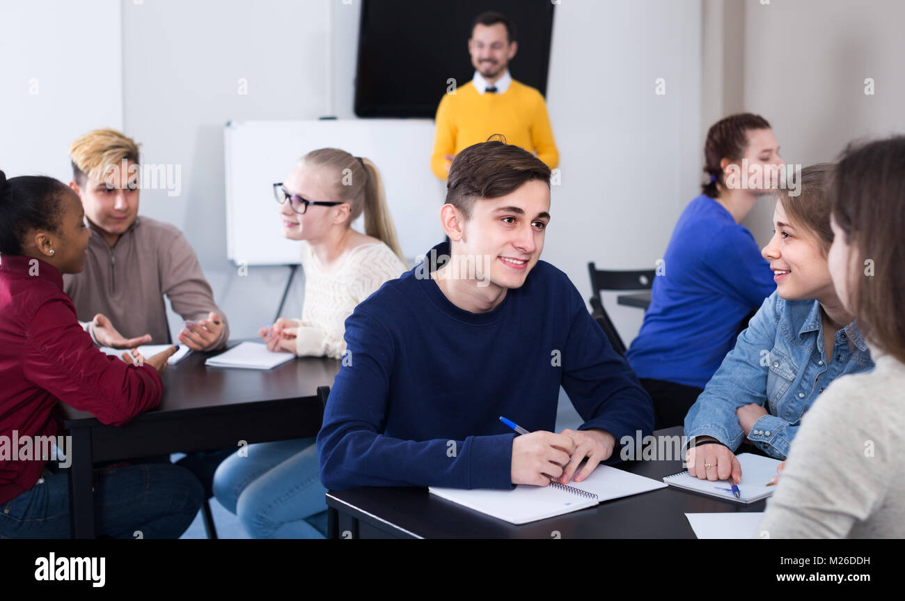 Students are having group exercises in school Stock Photo - Alamy