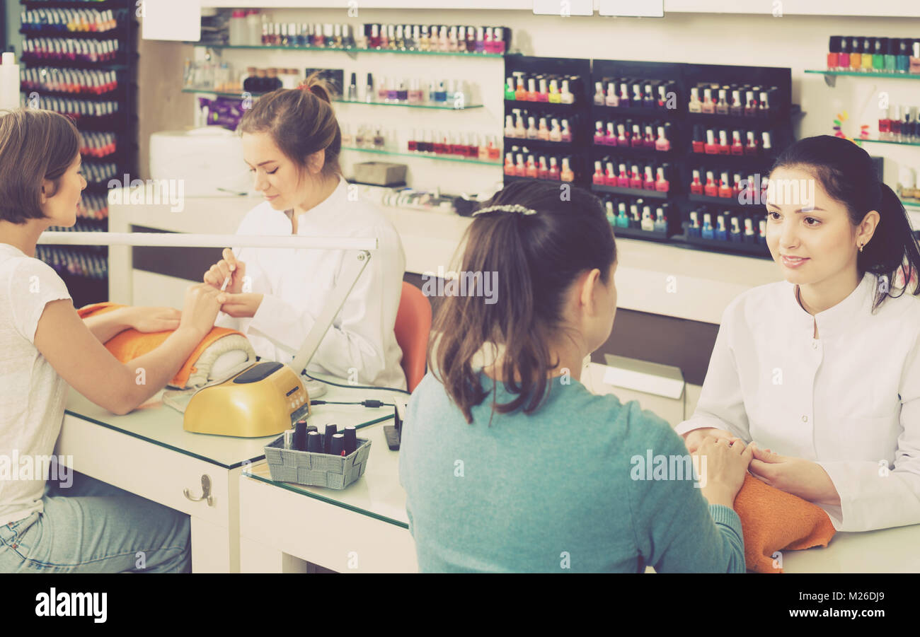 Nail technicians hand hi-res stock photography and images - Alamy