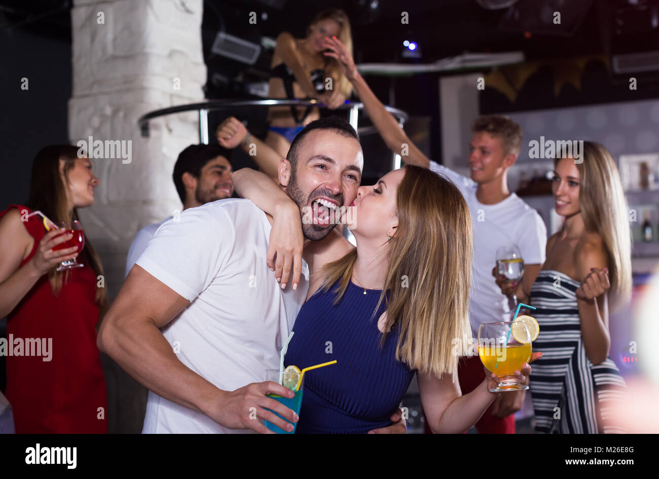 couple of happy people together in the night club with drinks Stock ...