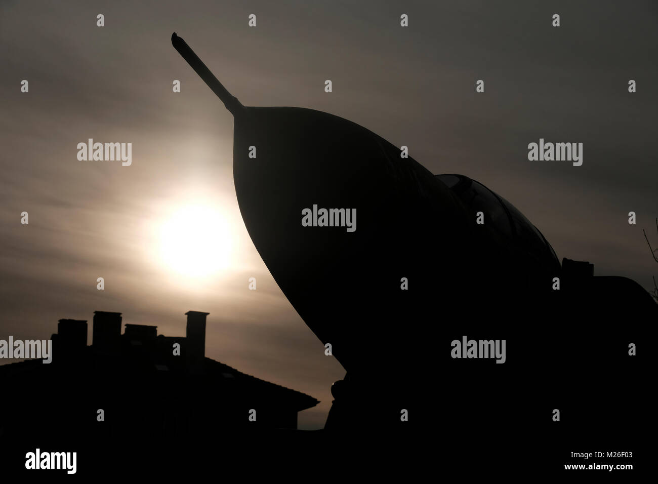 A silhouetted combat aircraft displayed at the courtyard of the ...
