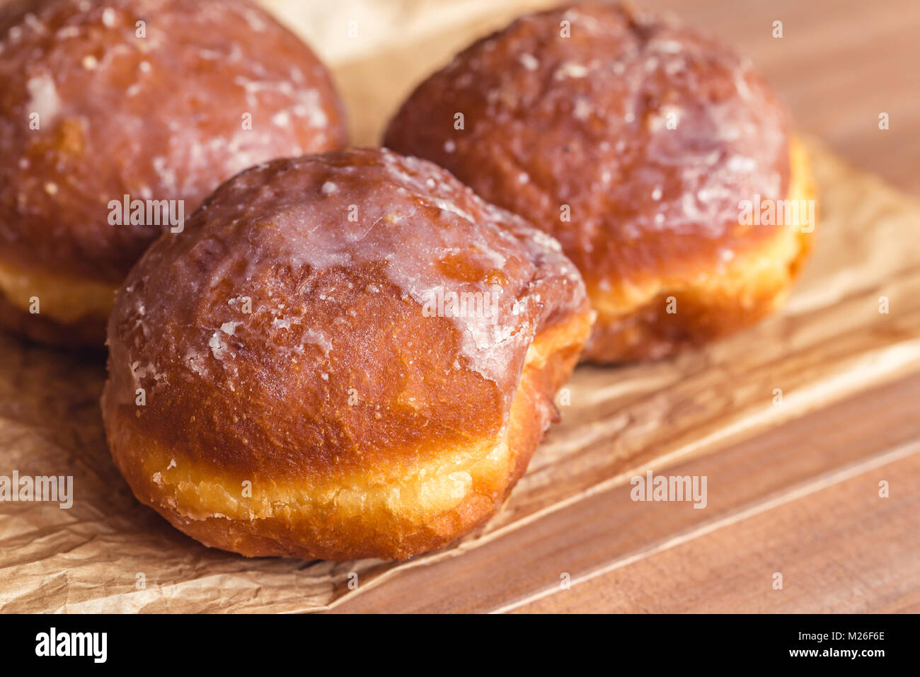 Traditional polish donut with icing Stock Photo - Alamy