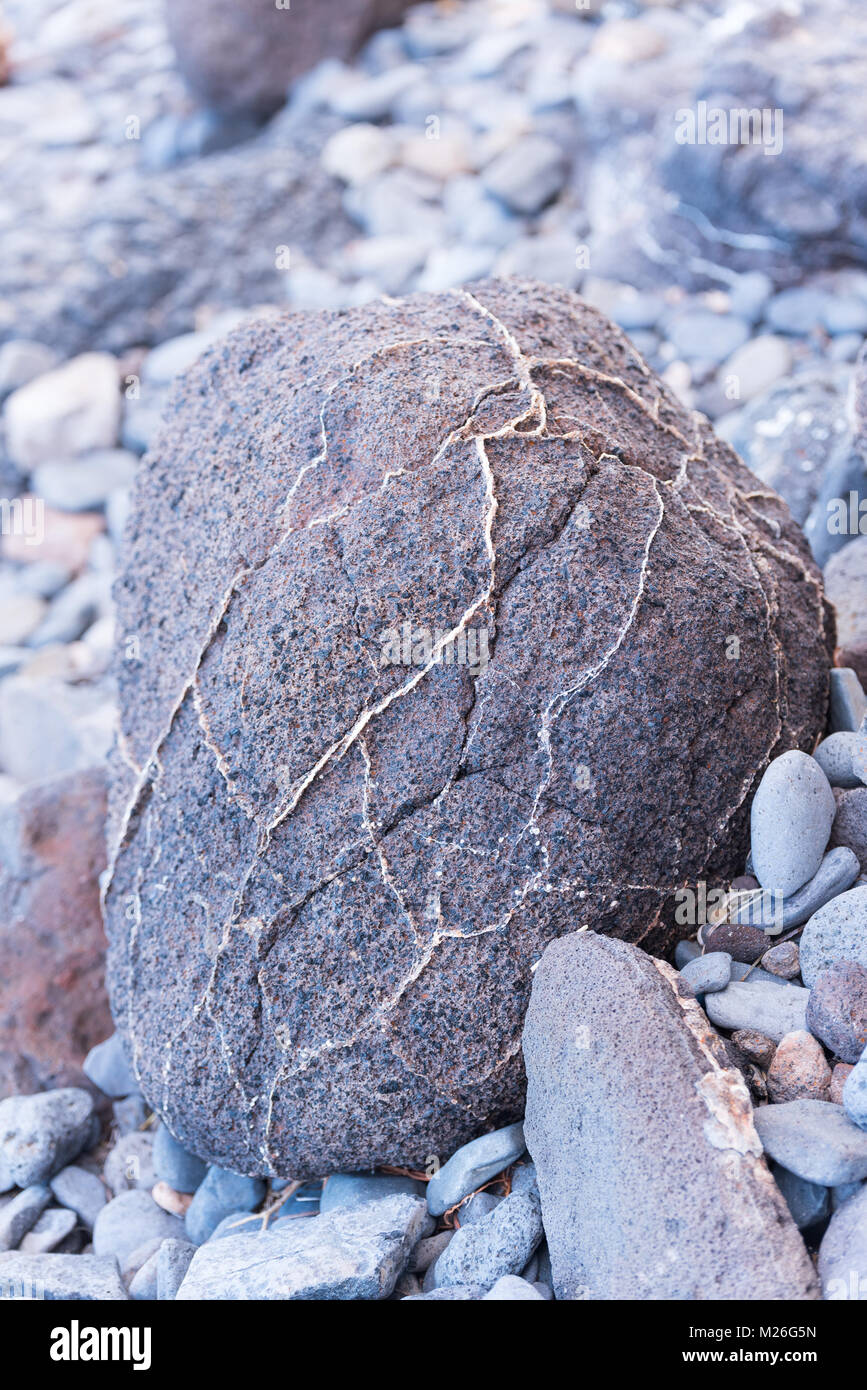View on a lava rock in a rock field Stock Photo - Alamy