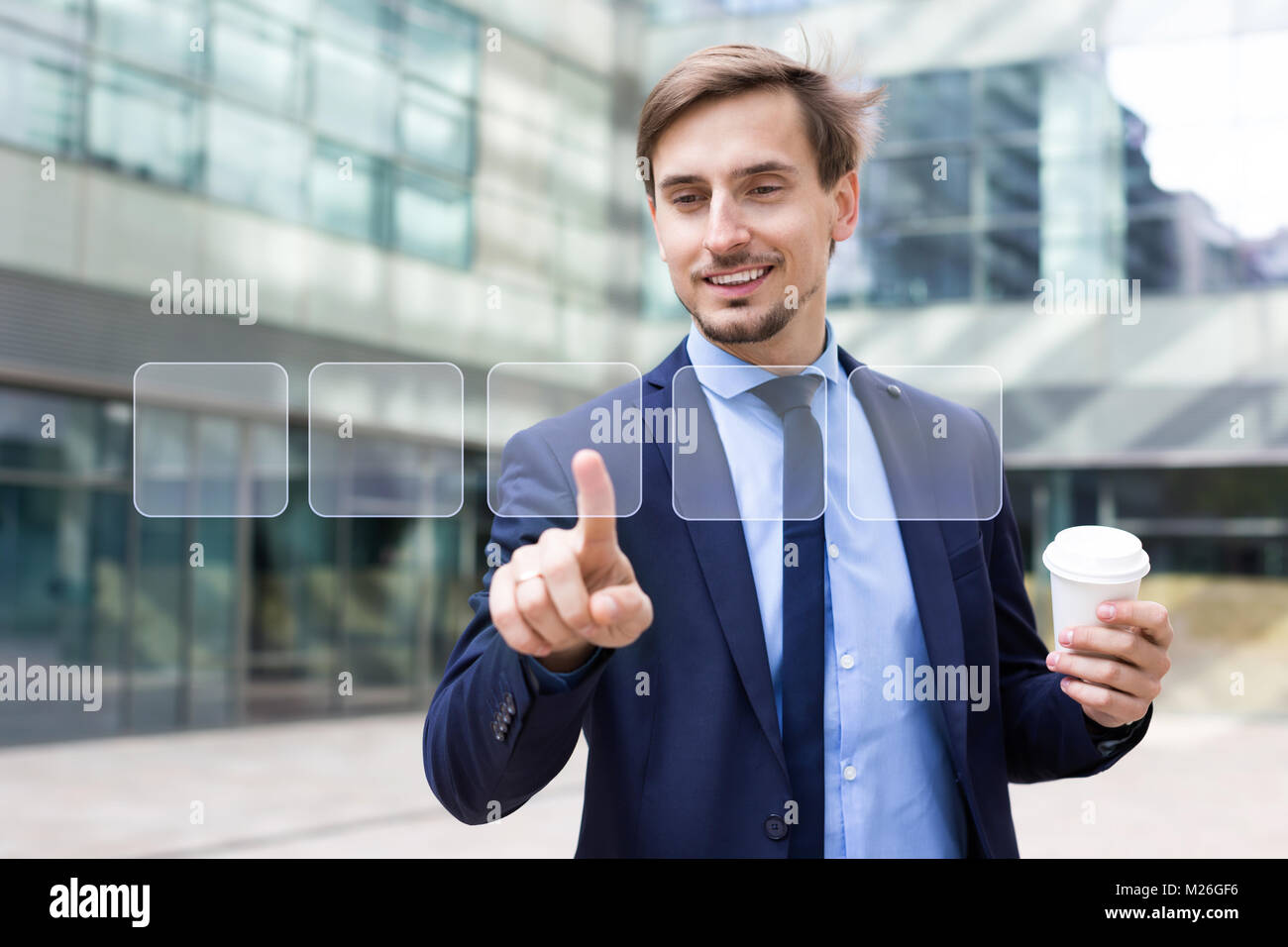 Man in business suit pressing icons on virtual digital touchscreen ...