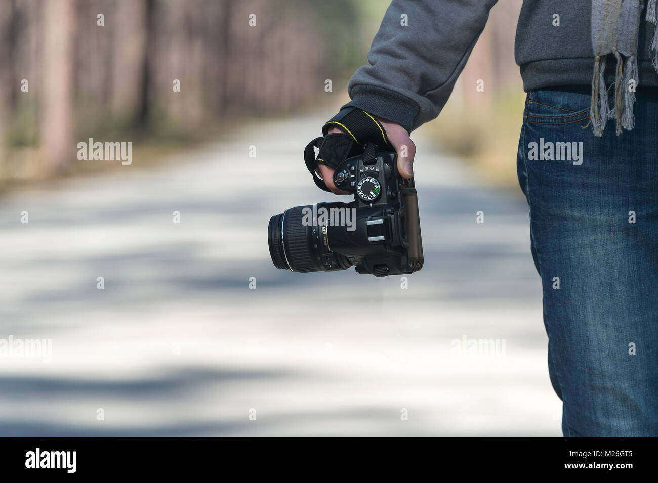 Woman photographer camera telephoto lens hi-res stock photography and ...