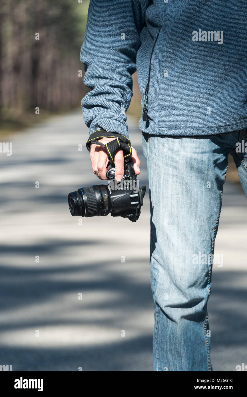 Nikon Camera Holding High Resolution Stock Photography and Images - Alamy