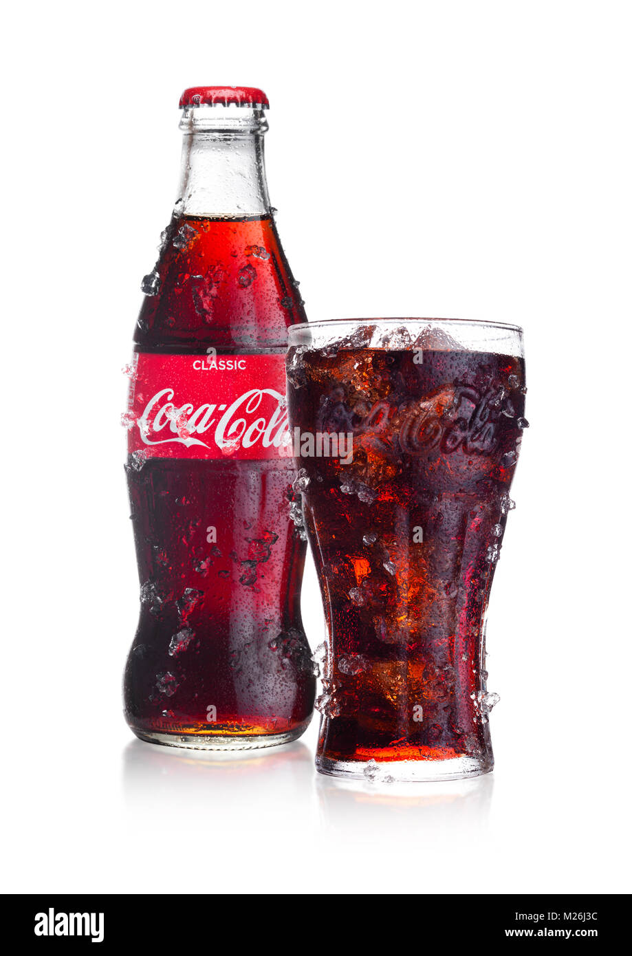 LONDON, UK - FEBRUARY 02, 2018: Cold bottle and glass of Classic Coca ...