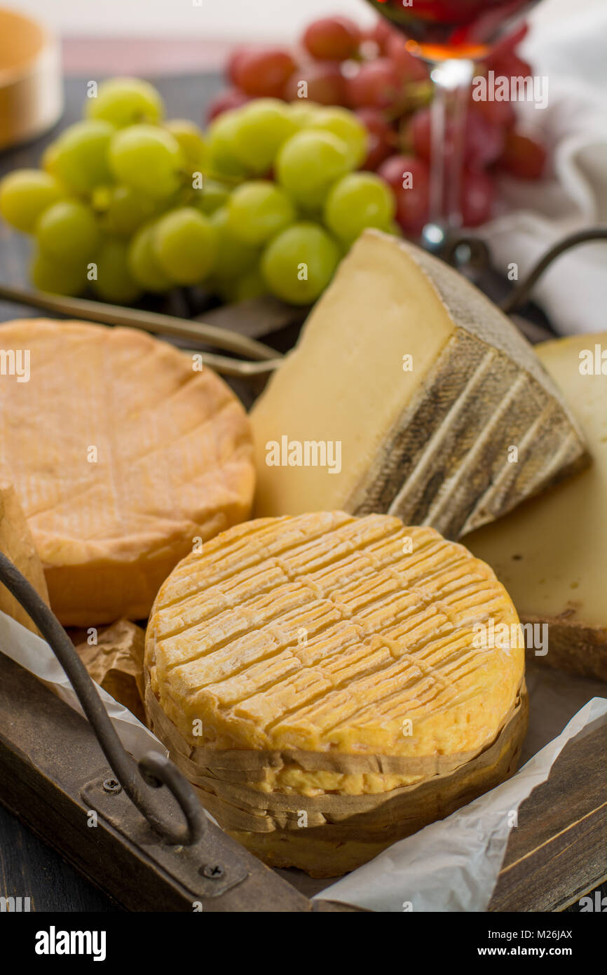 Tasting of oldest french AOC soft pudgent yellow cheese Livarot ...