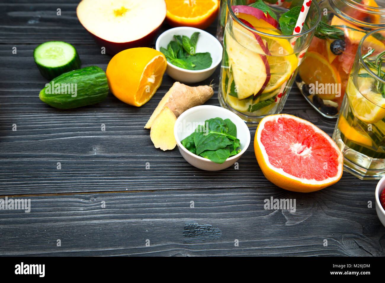 Detox water on black stone background Stock Photo - Alamy