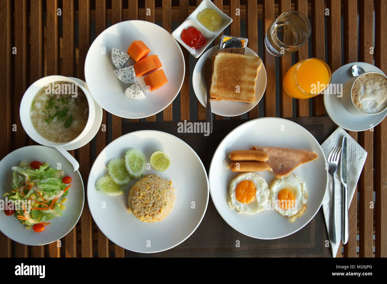 many kind of food on wooden table for breakfast meal Stock Photo - Alamy
