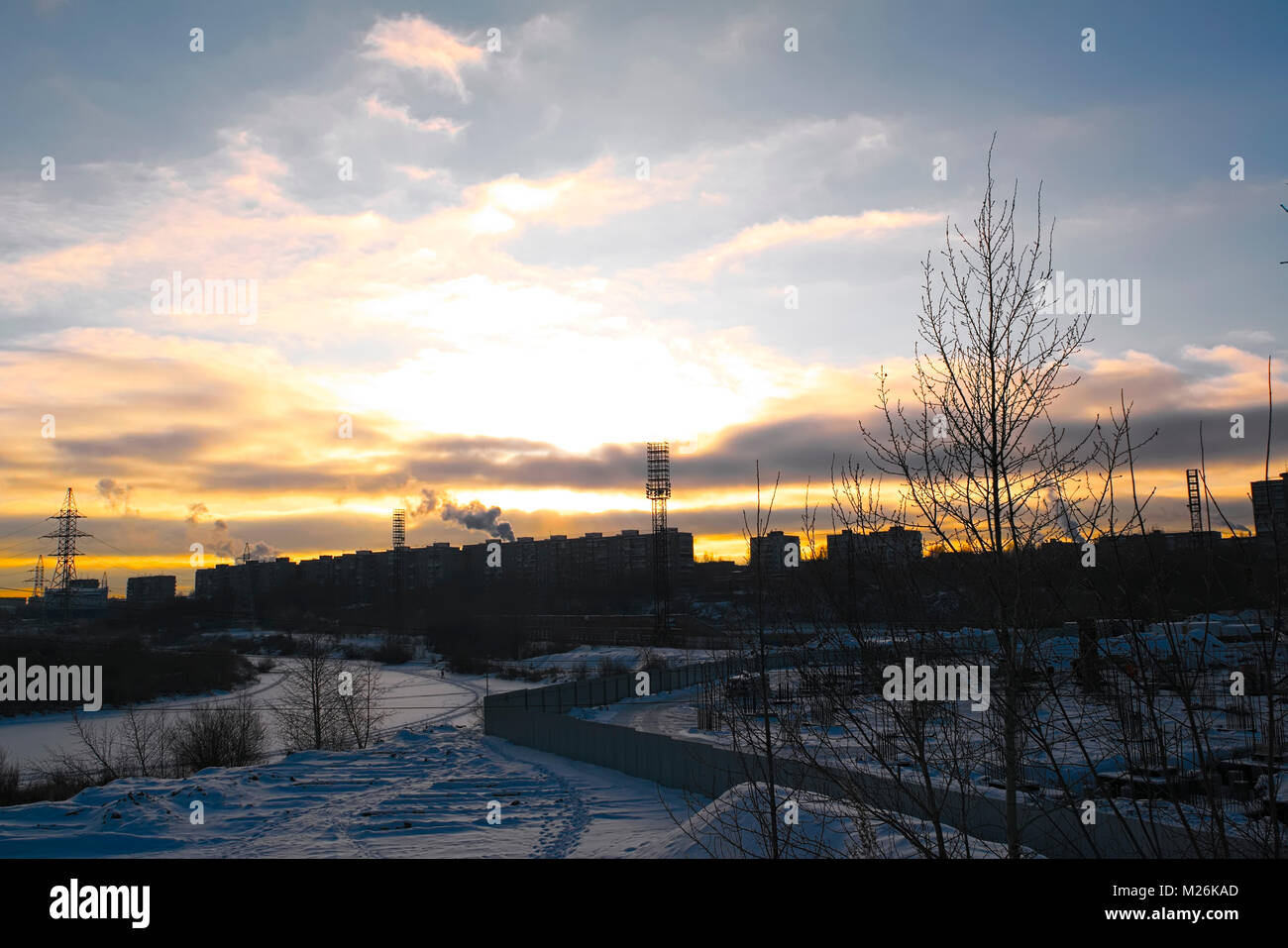 Sunset in the city in the winter Stock Photo - Alamy