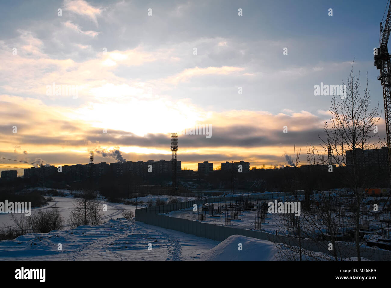 Sunset in the city in the winter Stock Photo - Alamy