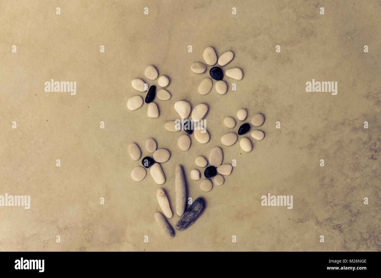 bunch of flowers made out of rocky pebbles Stock Photo - Alamy