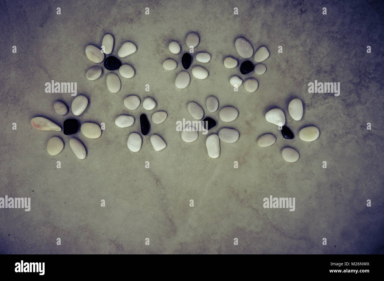 flower made from small pebbles Stock Photo - Alamy