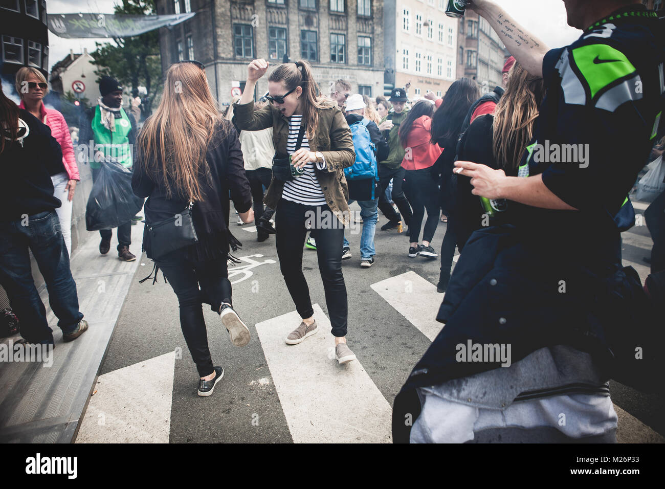 Party people are dancing, drinking and having fun at the annual block ...