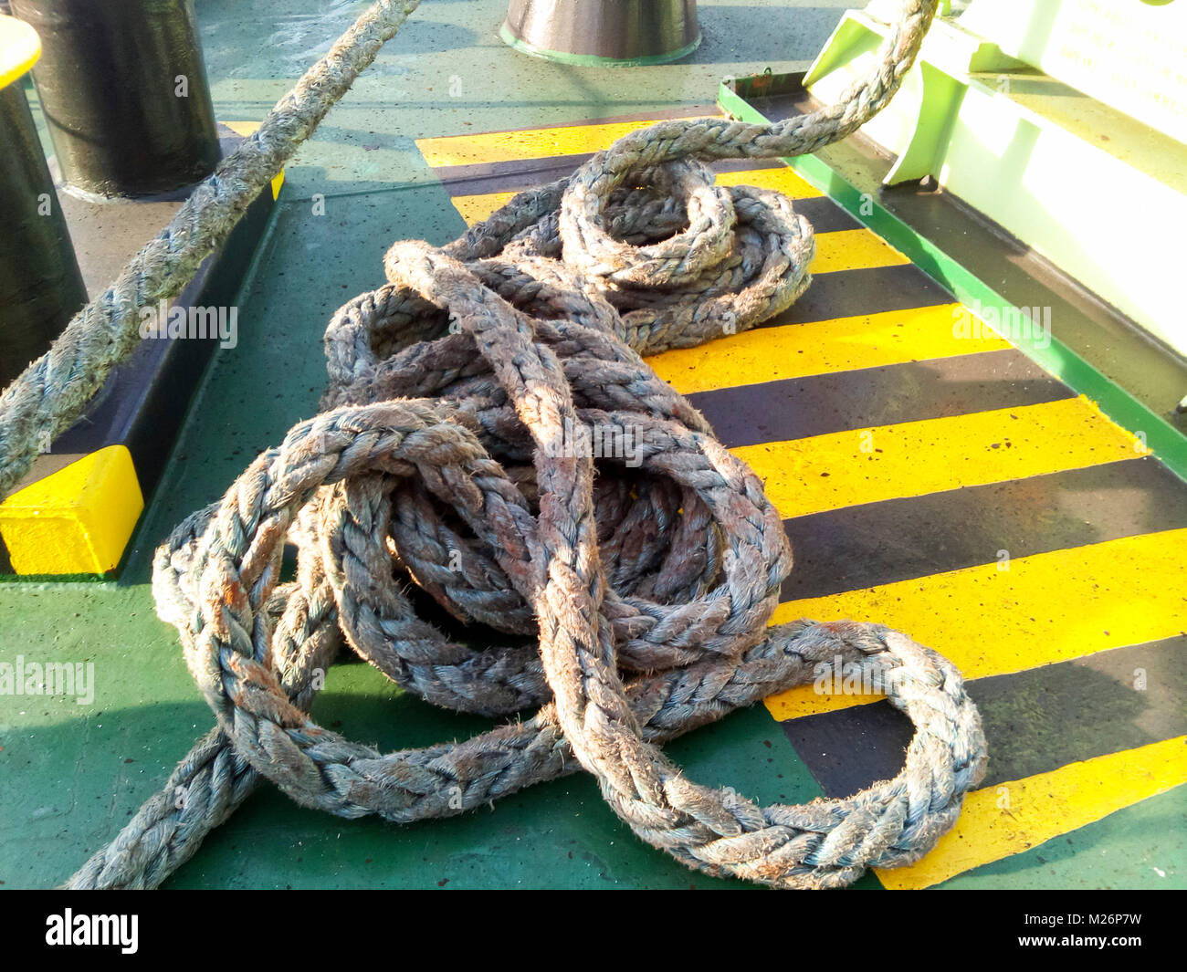 The sea rope on the deck of the ship Stock Photo - Alamy