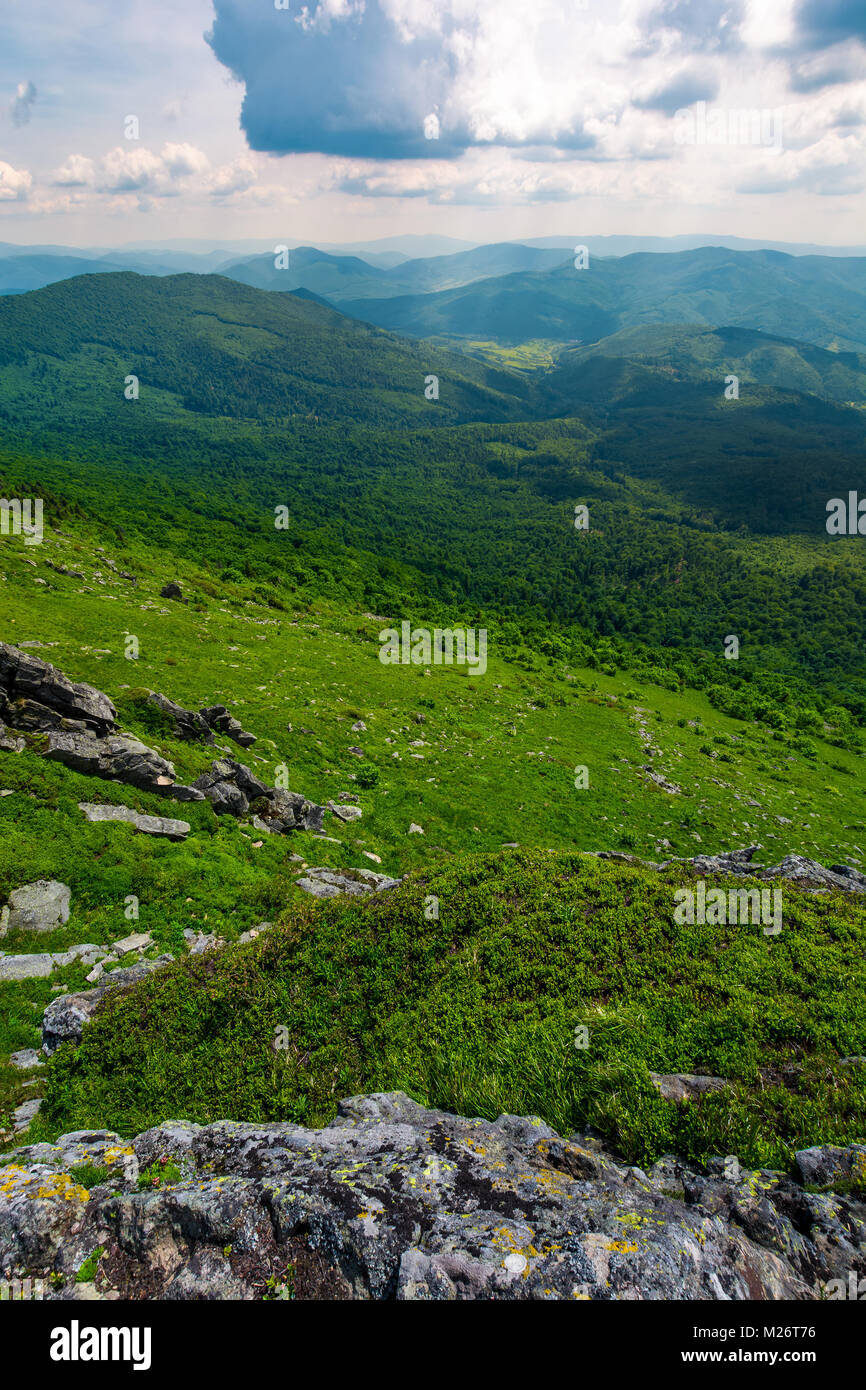 mountain behind the valley viewed from rocky cliff. beautiful summer ...
