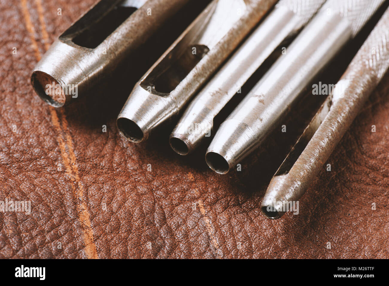 metal round puncher for leather work and DIY Stock Photo - Alamy