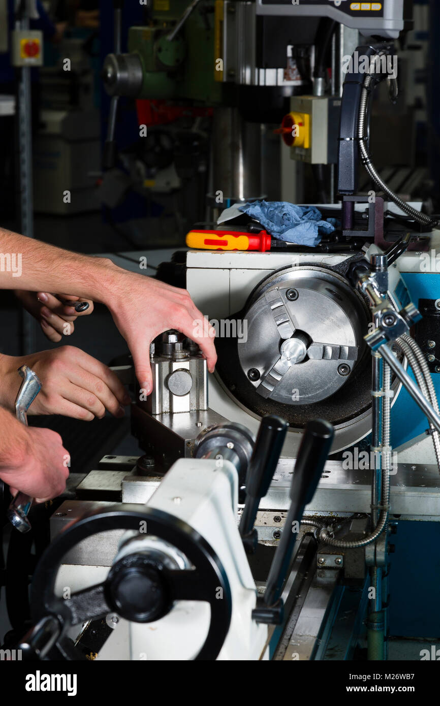 Man working on lathe hi-res stock photography and images - Alamy