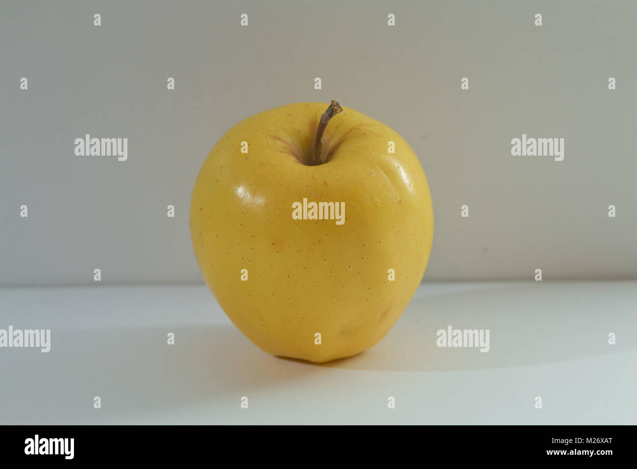 Golden apple delicious isolated on white background. Clipping Path ...