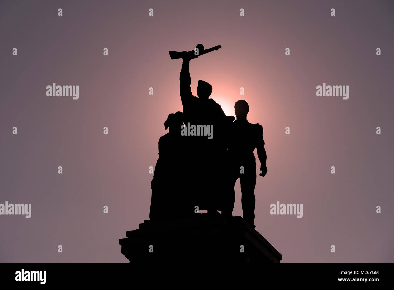 Silhouetted view of the Soviet-era monument to the Soviet Army located ...