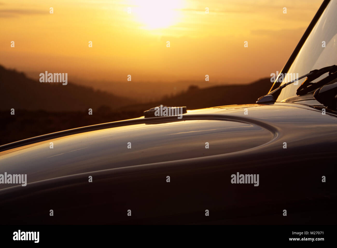 car at sunset Stock Photo - Alamy