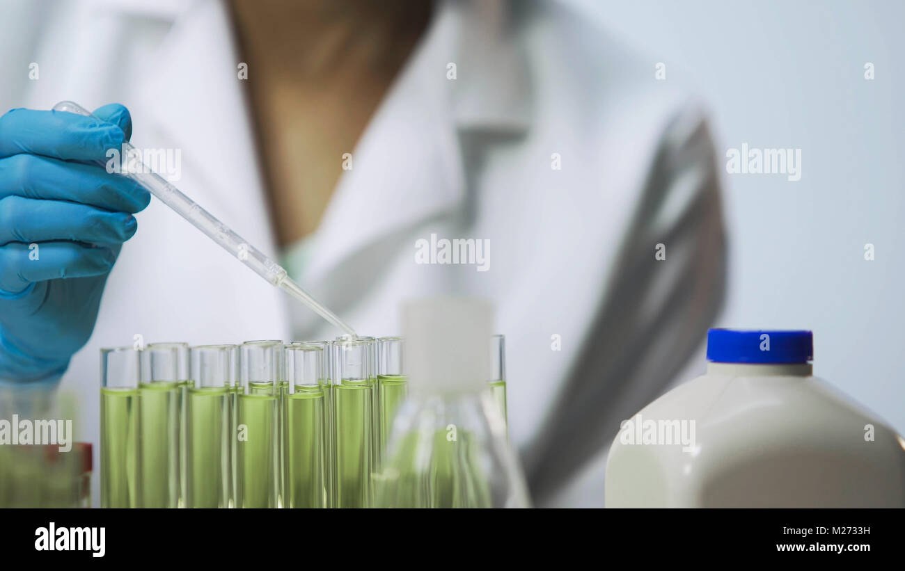 Scientist using pipette close hi-res stock photography and images - Alamy