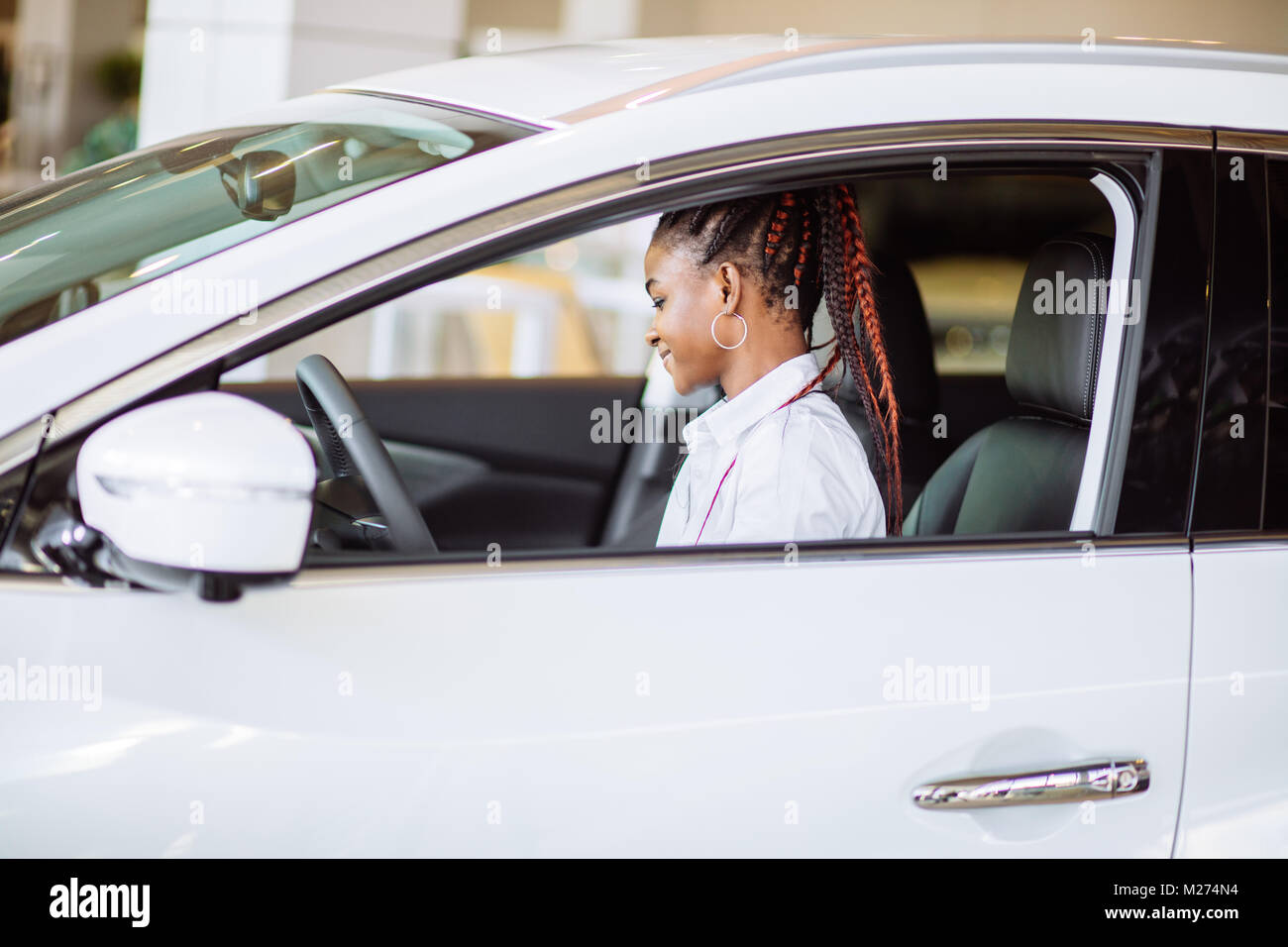 Happy african driver inside car hi-res stock photography and images - Alamy