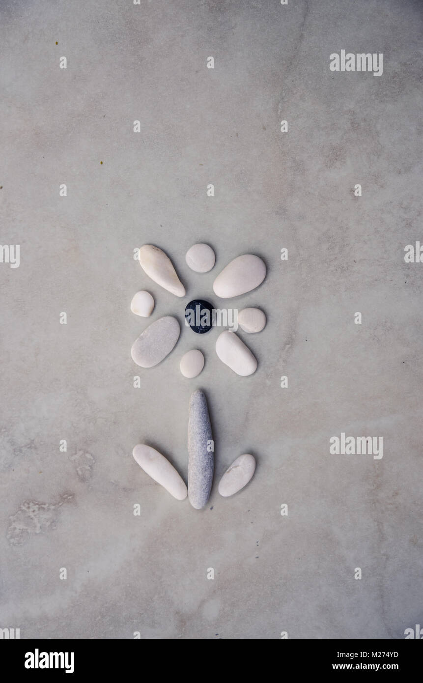 flower made from small pebbles Stock Photo - Alamy