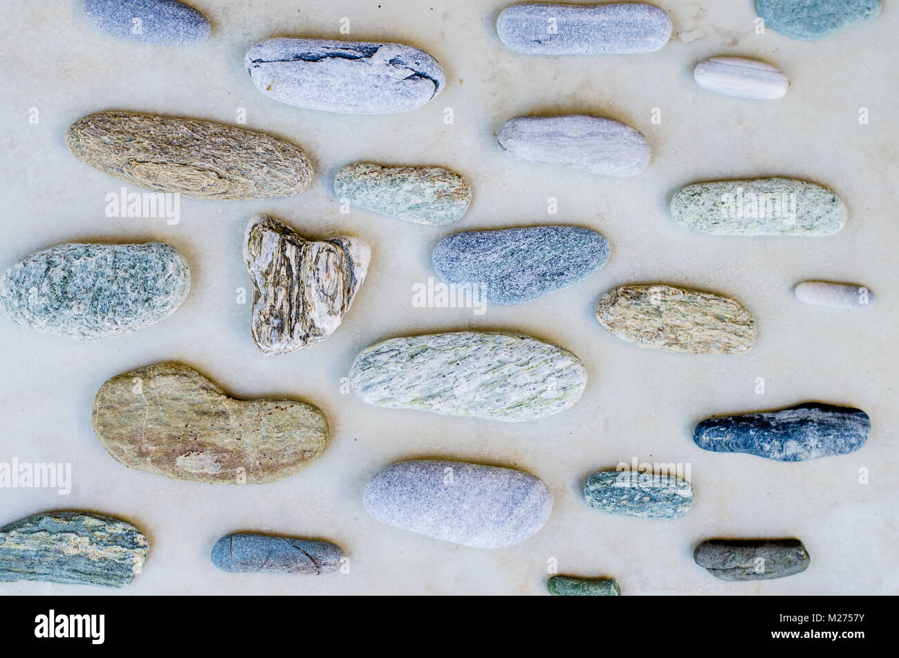 group of sea pebble background top view Stock Photo - Alamy