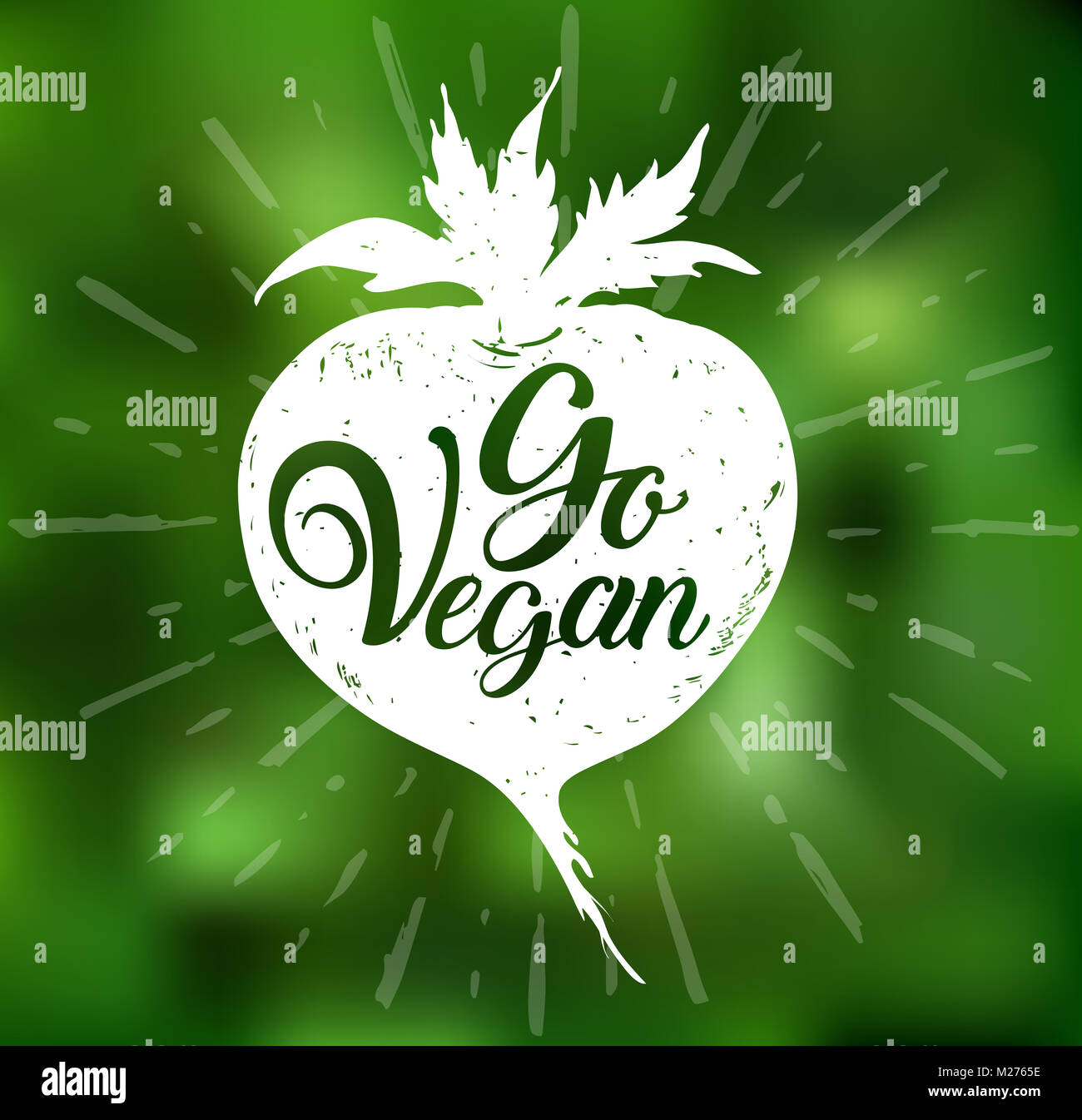 Root vegetable and lettering Go vegan on a green blurred background ...
