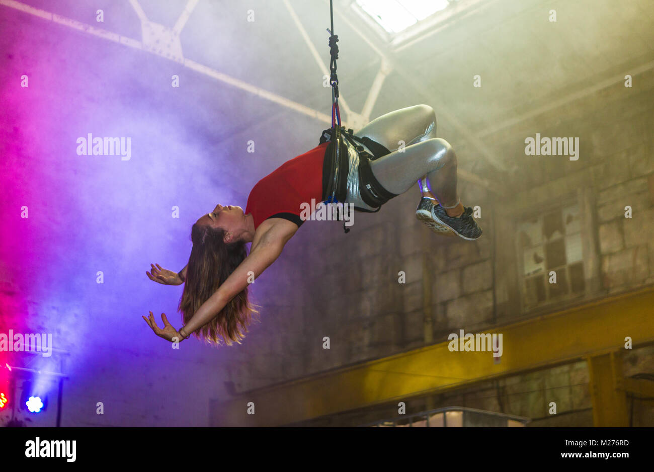 An aerial dancer performs whilst suspended from a harness at the Royal ...