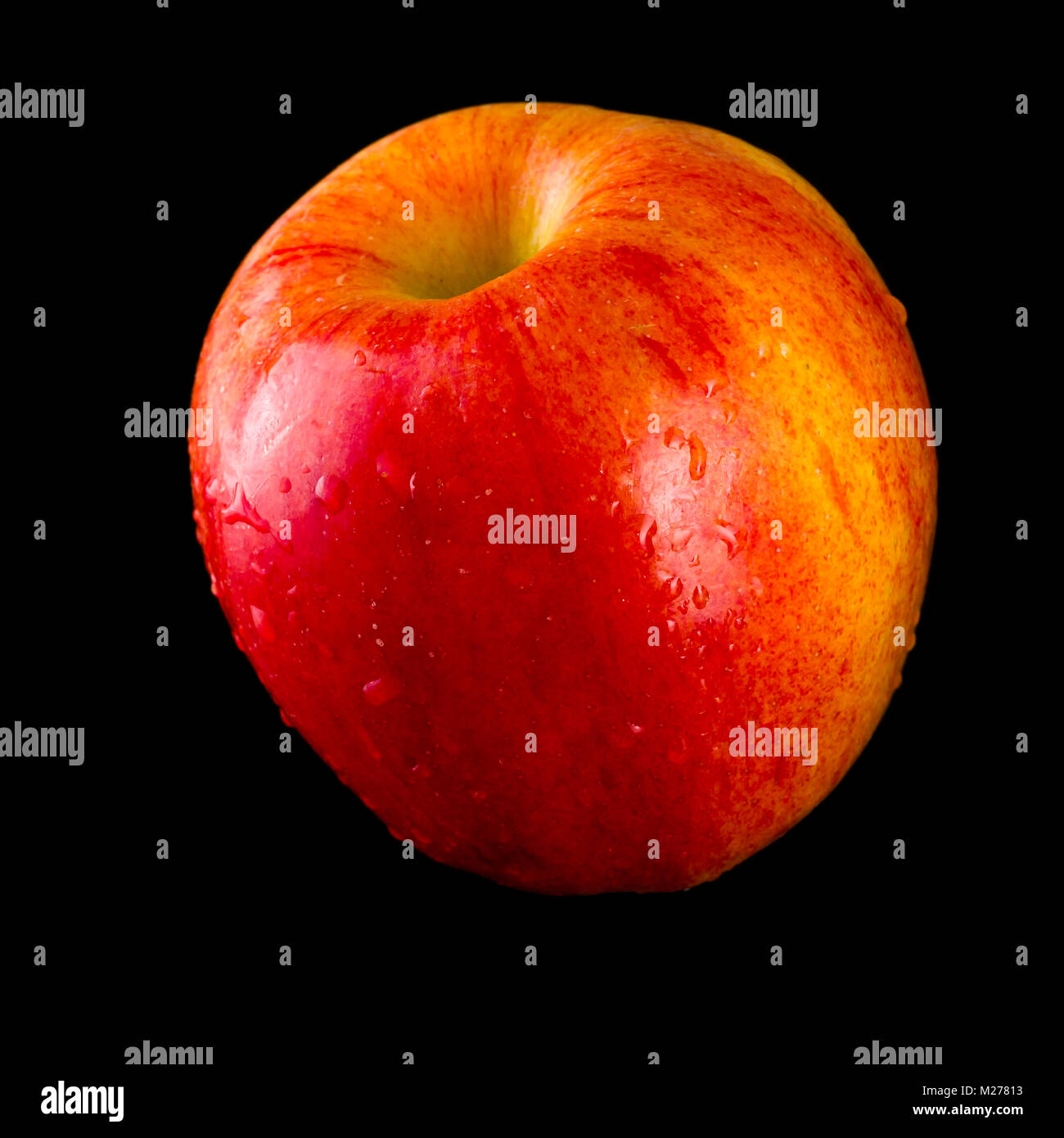 Red apple on a black background Stock Photo - Alamy