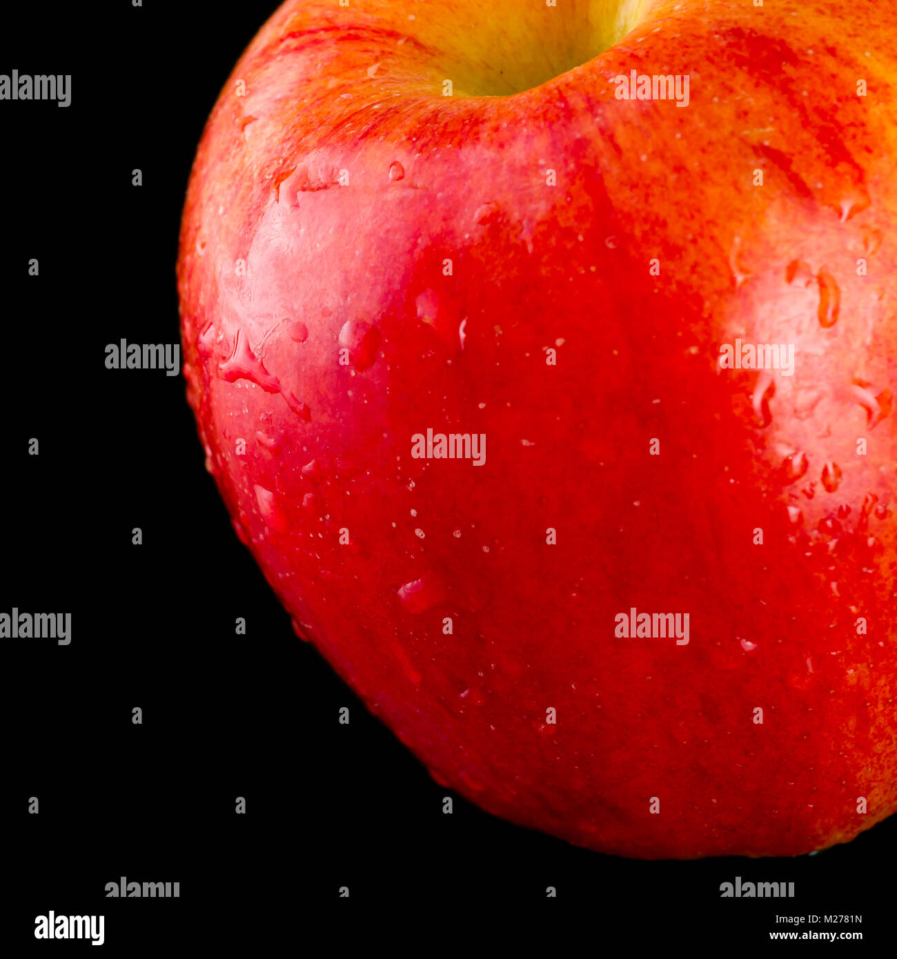 Red apple on a black background Stock Photo - Alamy