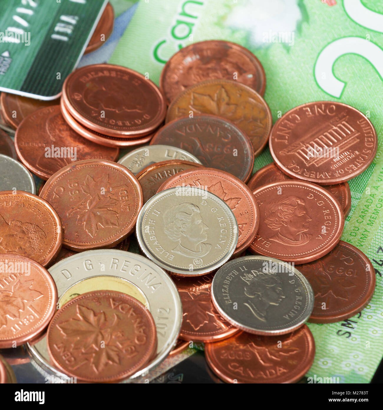 Canadian money on a black background Stock Photo - Alamy