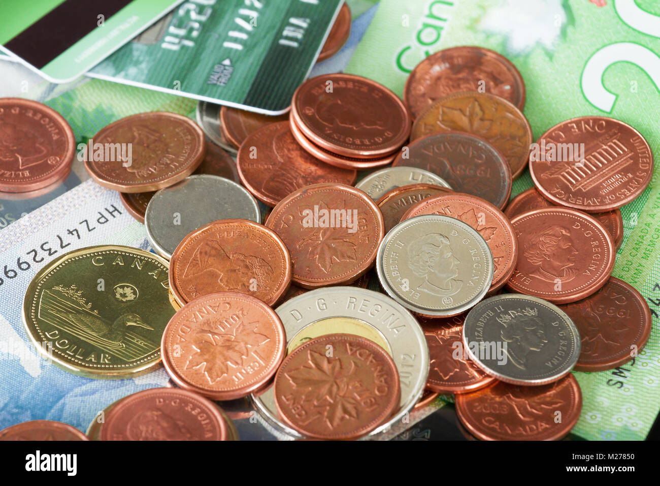 Canadian money on a black background Stock Photo - Alamy