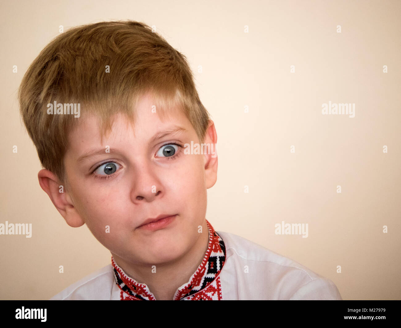 Surprised Caucasian boy Stock Photo - Alamy