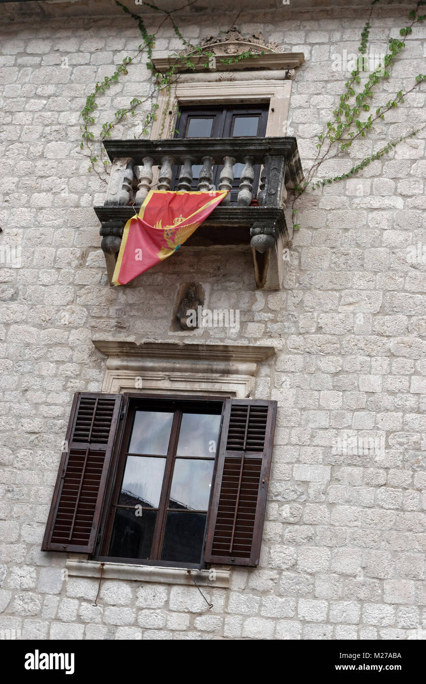 Montenegro flag in Kotor town, Montenegro Stock Photo - Alamy
