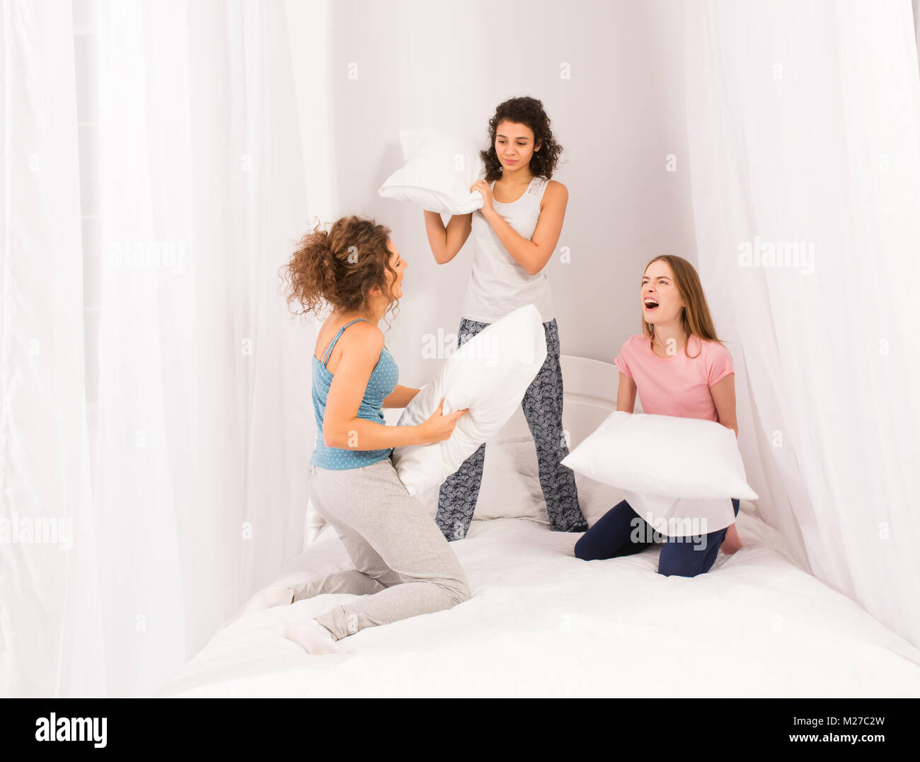 Funny pillow game Stock Photo - Alamy