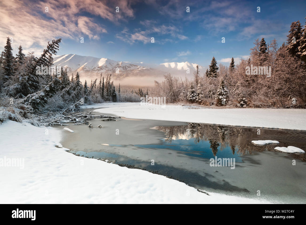 Morning light and early winter snow adorn the North Fork of Eagle River ...